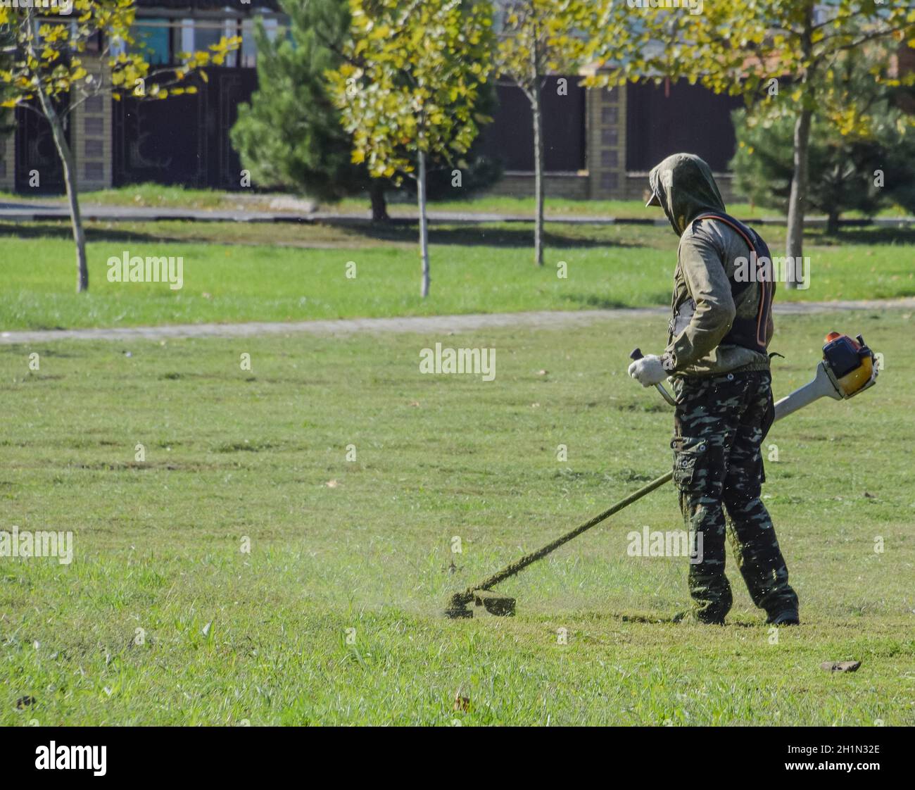 Worker mowing hi-res stock photography and images - Alamy