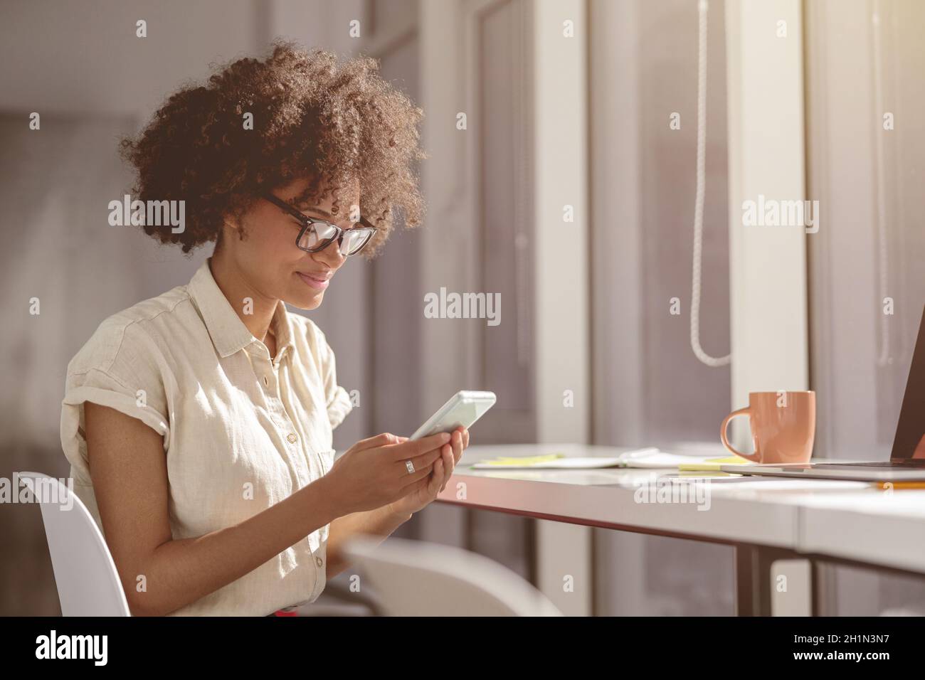 Young businesswoman reading notepad hi-res stock photography and images ...