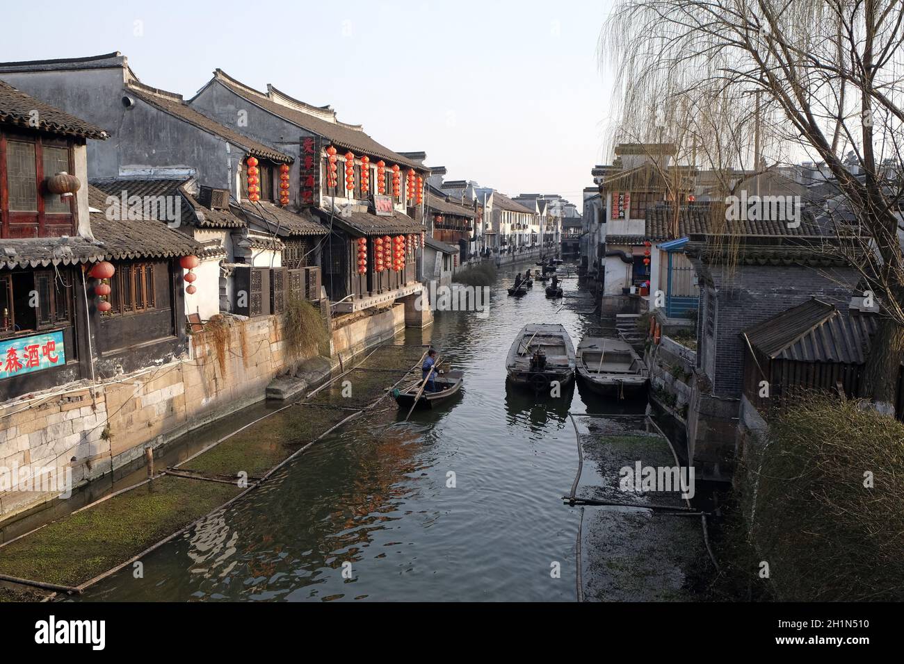 Tourist boats on the water canals of Xitang Town in Zhejiang Province ...