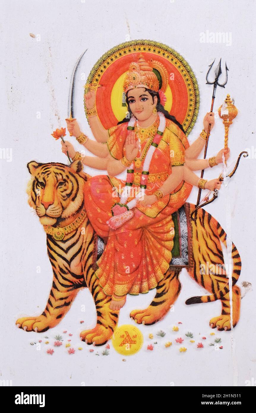Colorful illustration of Hindu goddess Durga on the wall in Pushkar ...