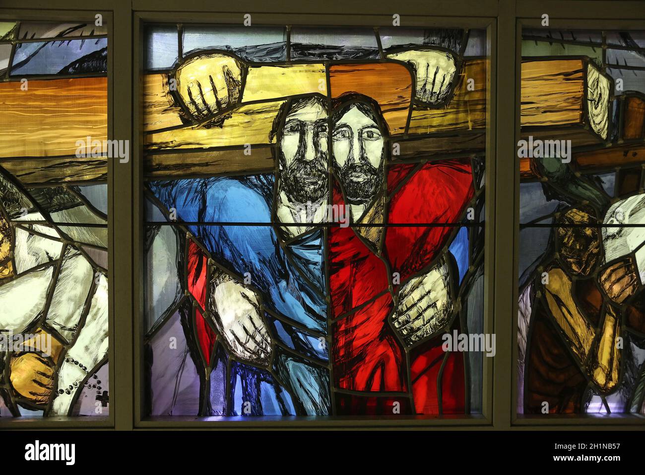 Simon of Cyrene carries the cross, stained glass window by Sieger Koder ...