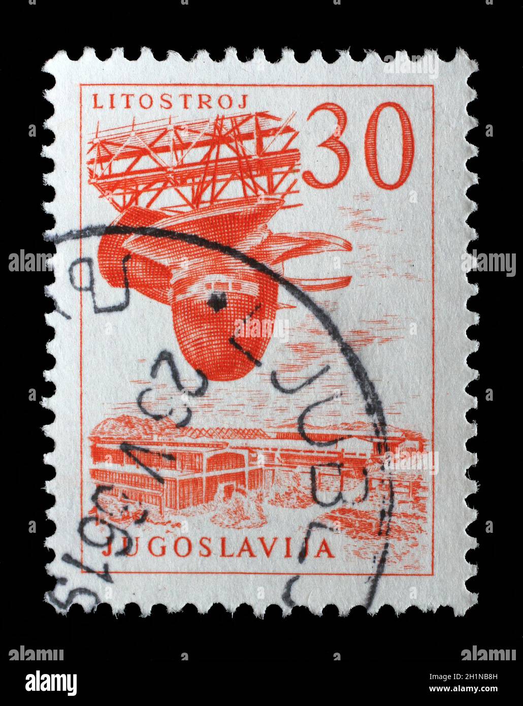 Stamp printed in the Yugoslavia shows Litostroj turbine factory, circa ...