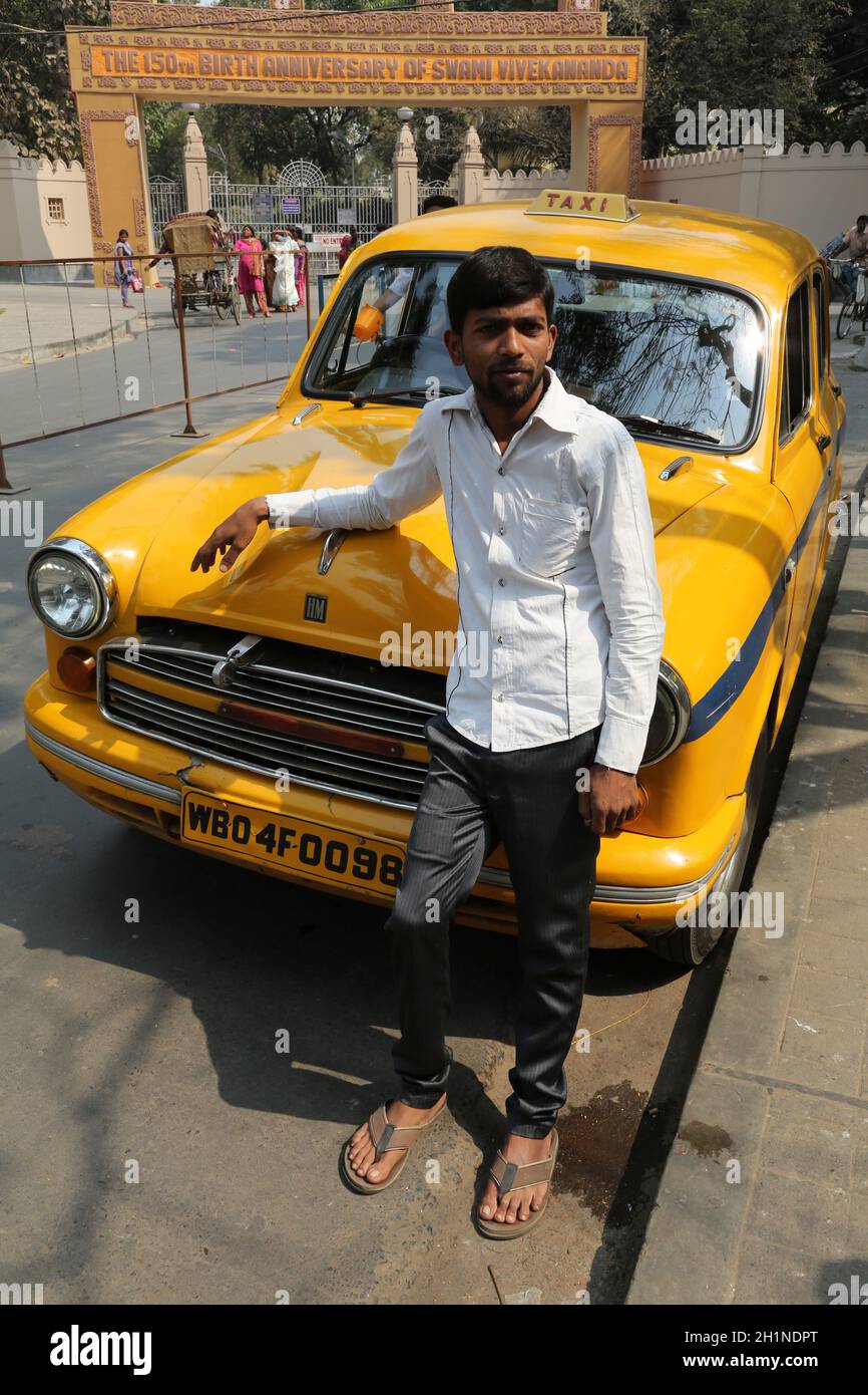 Indian taxi driver posing in front of his cab in Kolkata Stock Photo ...