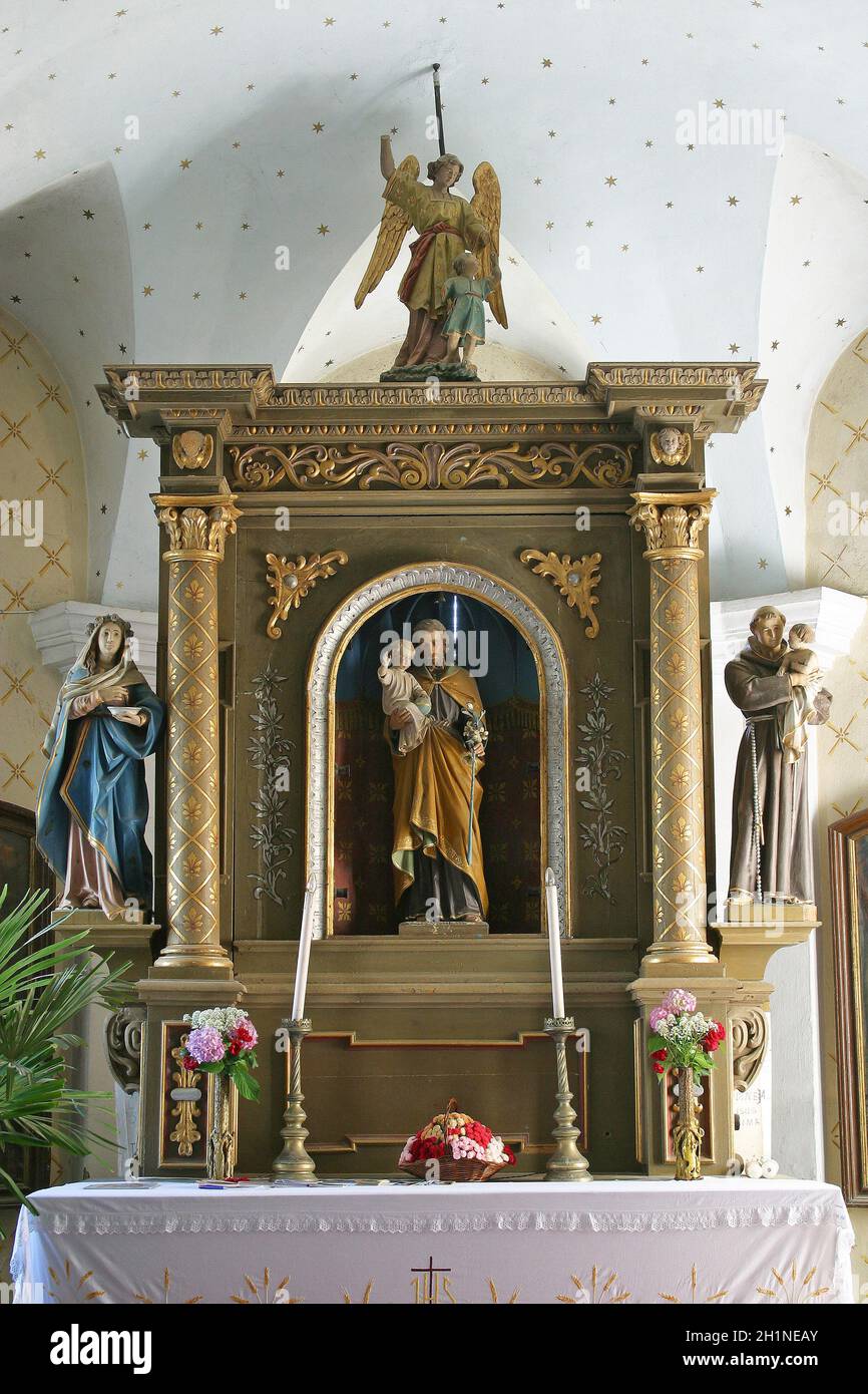 The altar of Saint Joseph in the parish church of the Holy Trinity in ...