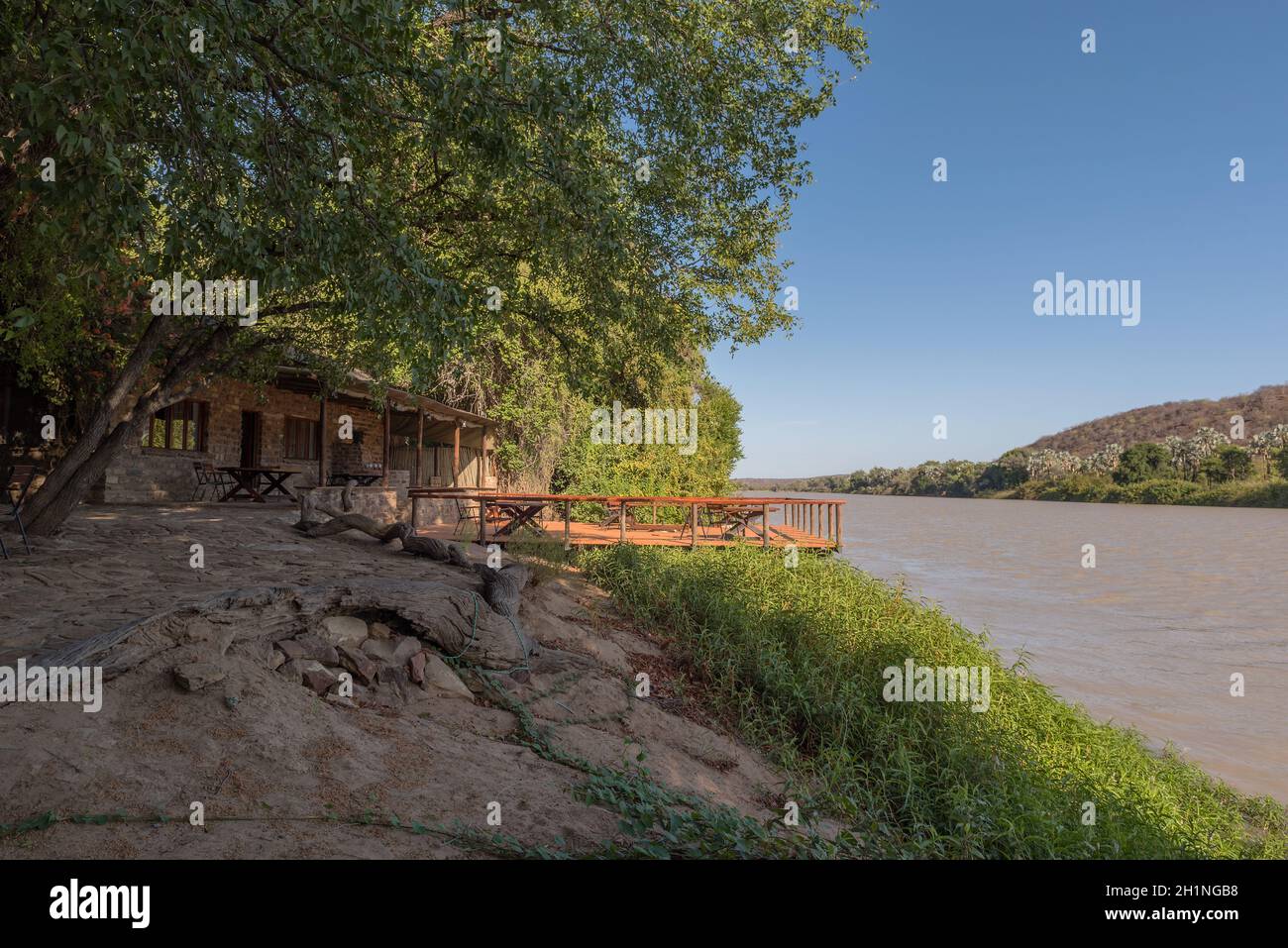 Wooden terrace with a view of the Kunene River, Namibia Stock Photo - Alamy