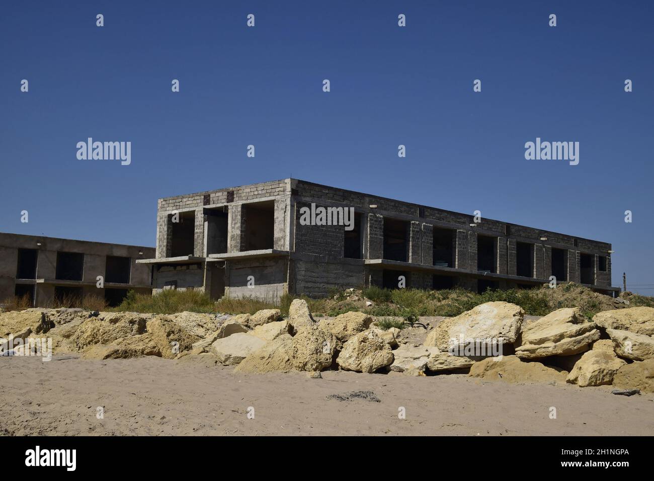 Unfinished building of gray block. Home construction Stock Photo - Alamy