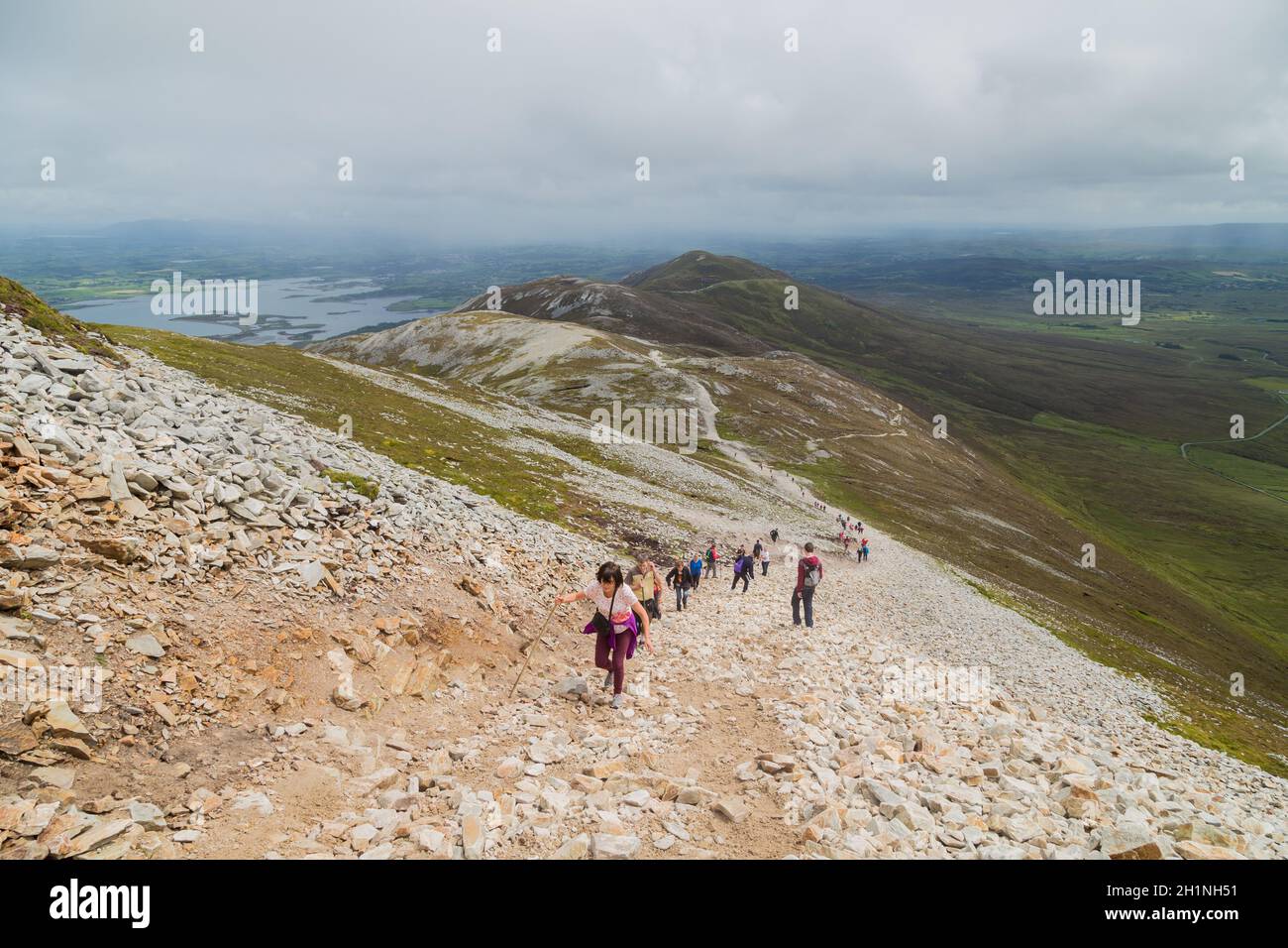 Trail, Rocks and vegetation at Croagh Patrick mountain with Westport in ...
