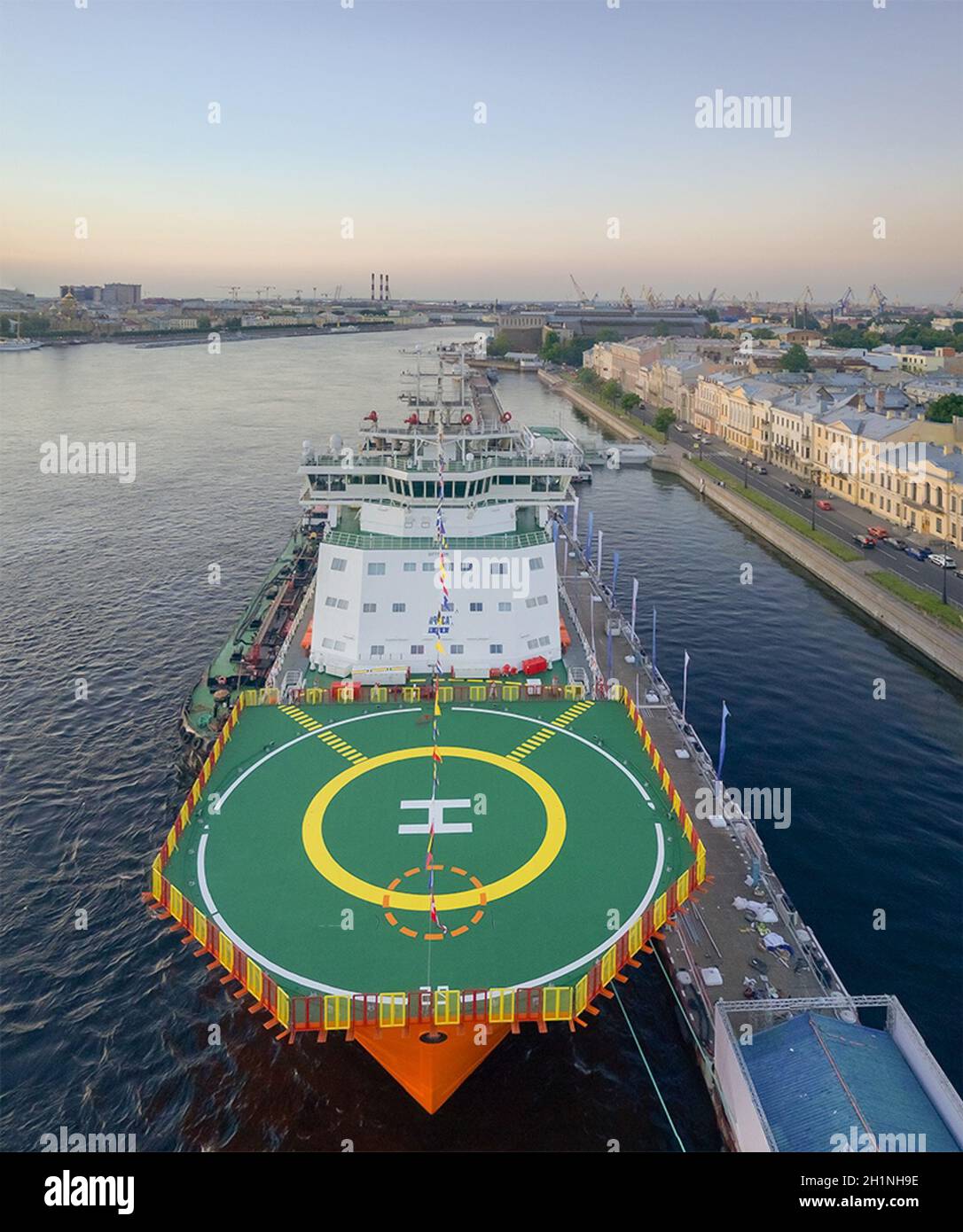 A ship with a helipad in the river port of St. Petersburg Stock Photo ...