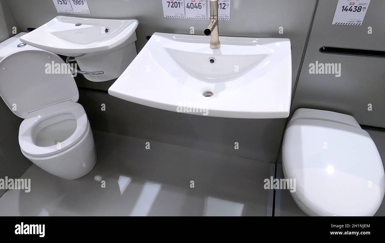 Kyiv, Ukraine - August 15, 2020: Rows of modern toilet bowls in a store ...