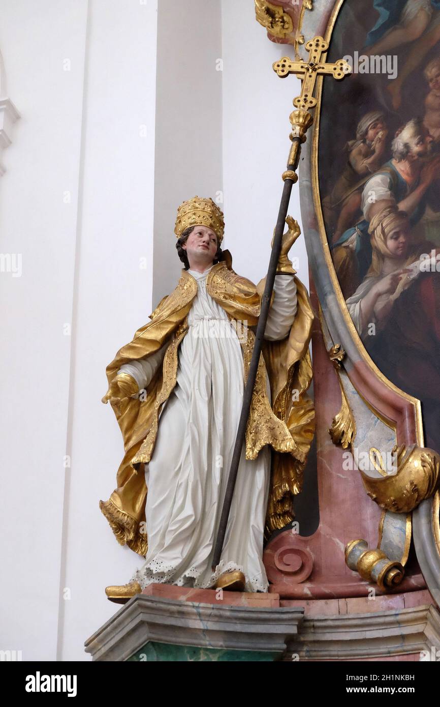 Statue of Saint, Altar in Collegiate church in Salzburg Stock Photo - Alamy