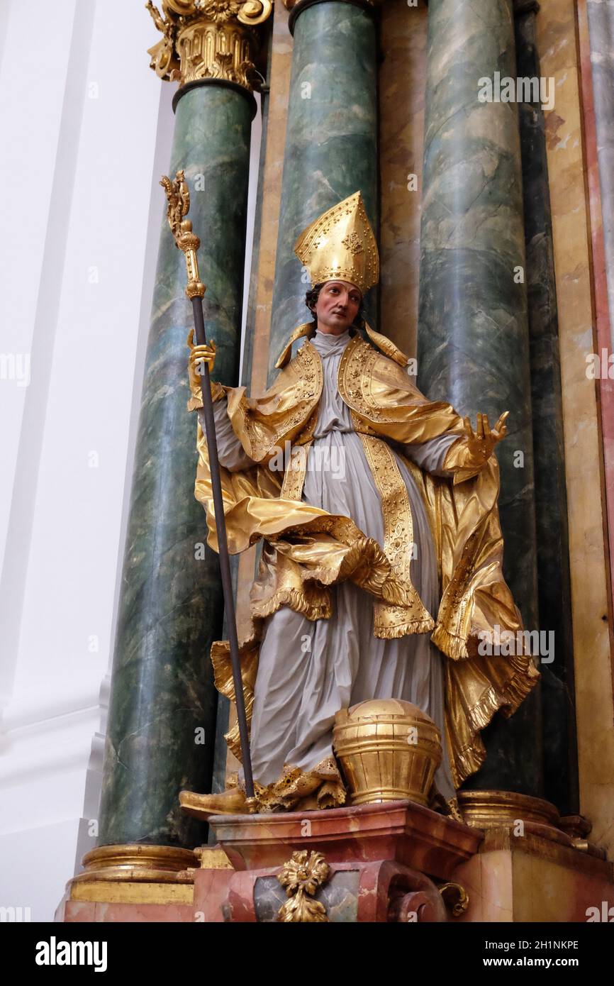 Statue of Saint, Altar in Collegiate church in Salzburg Stock Photo - Alamy