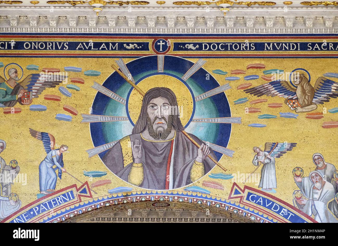 Christ giving a blessing, flanked by two angels on a gold background in ...