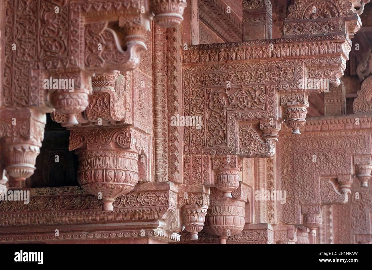 Columns with stone carving in Agra Fort, UNESCO World heritage site in ...