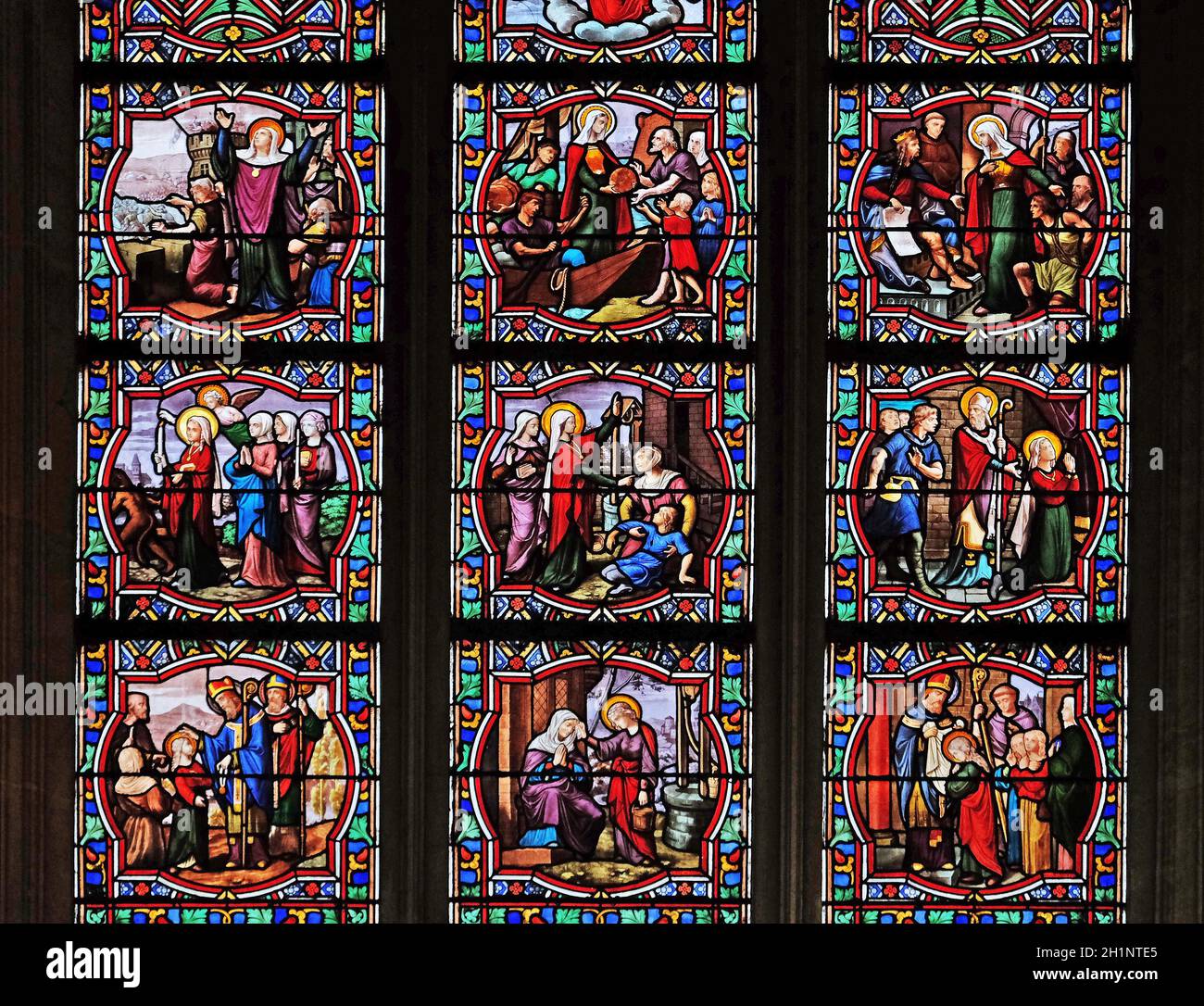 Scenes from the life of St. Genevieve, stained glass window in Church ...