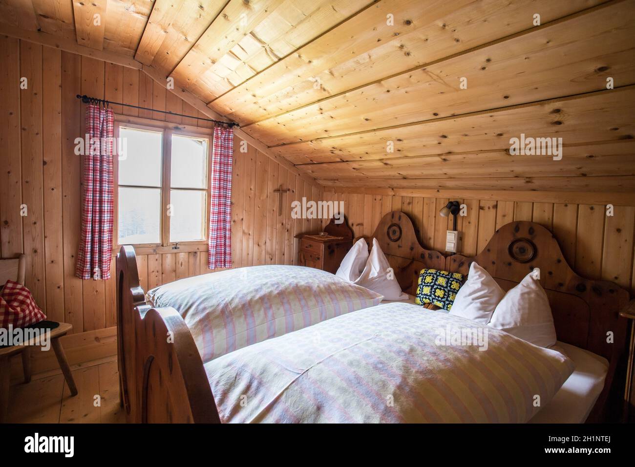 Bed inside hut house hi-res stock photography and images - Alamy