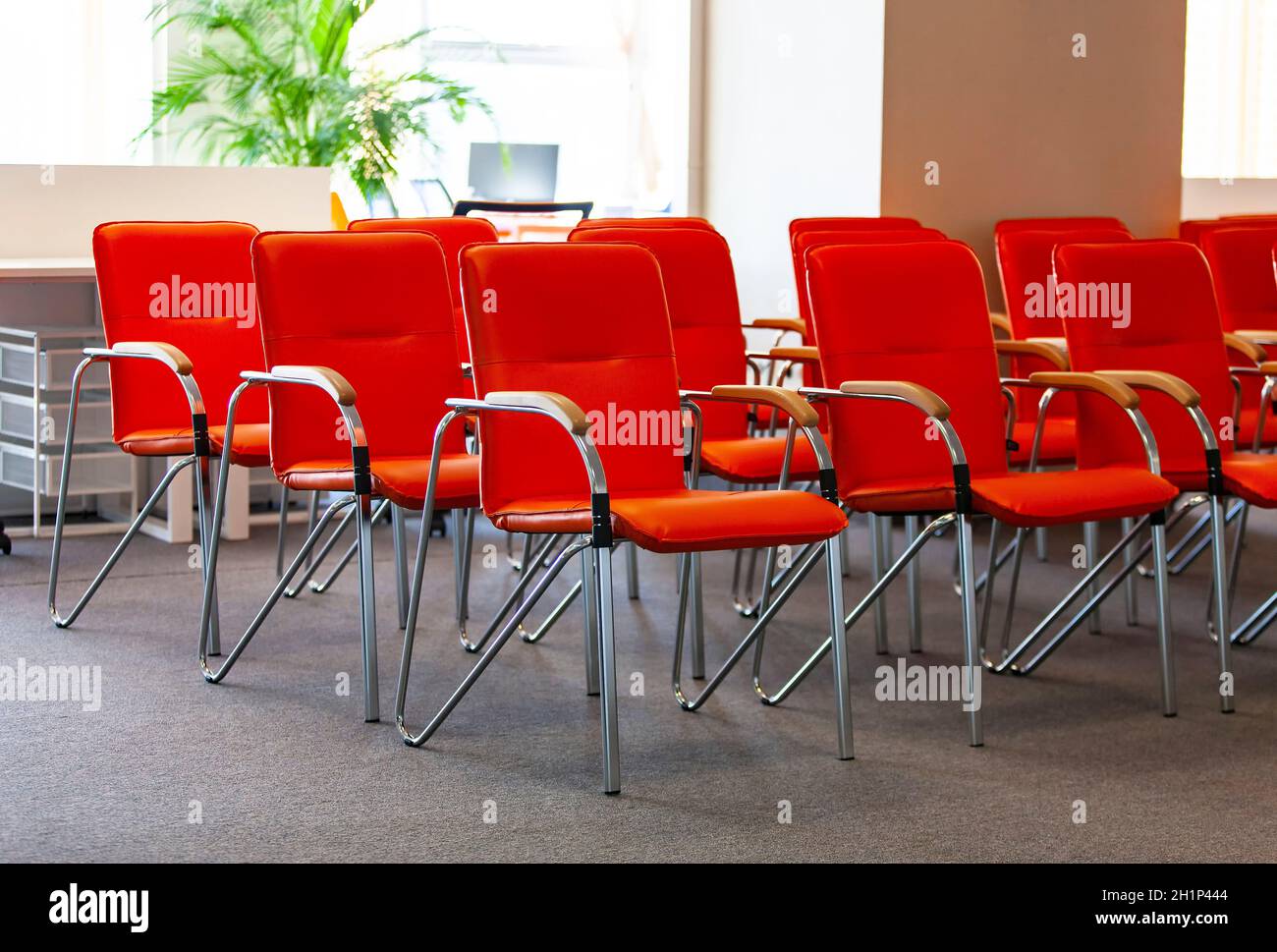 Row red comfortable chairs hi-res stock photography and images - Alamy