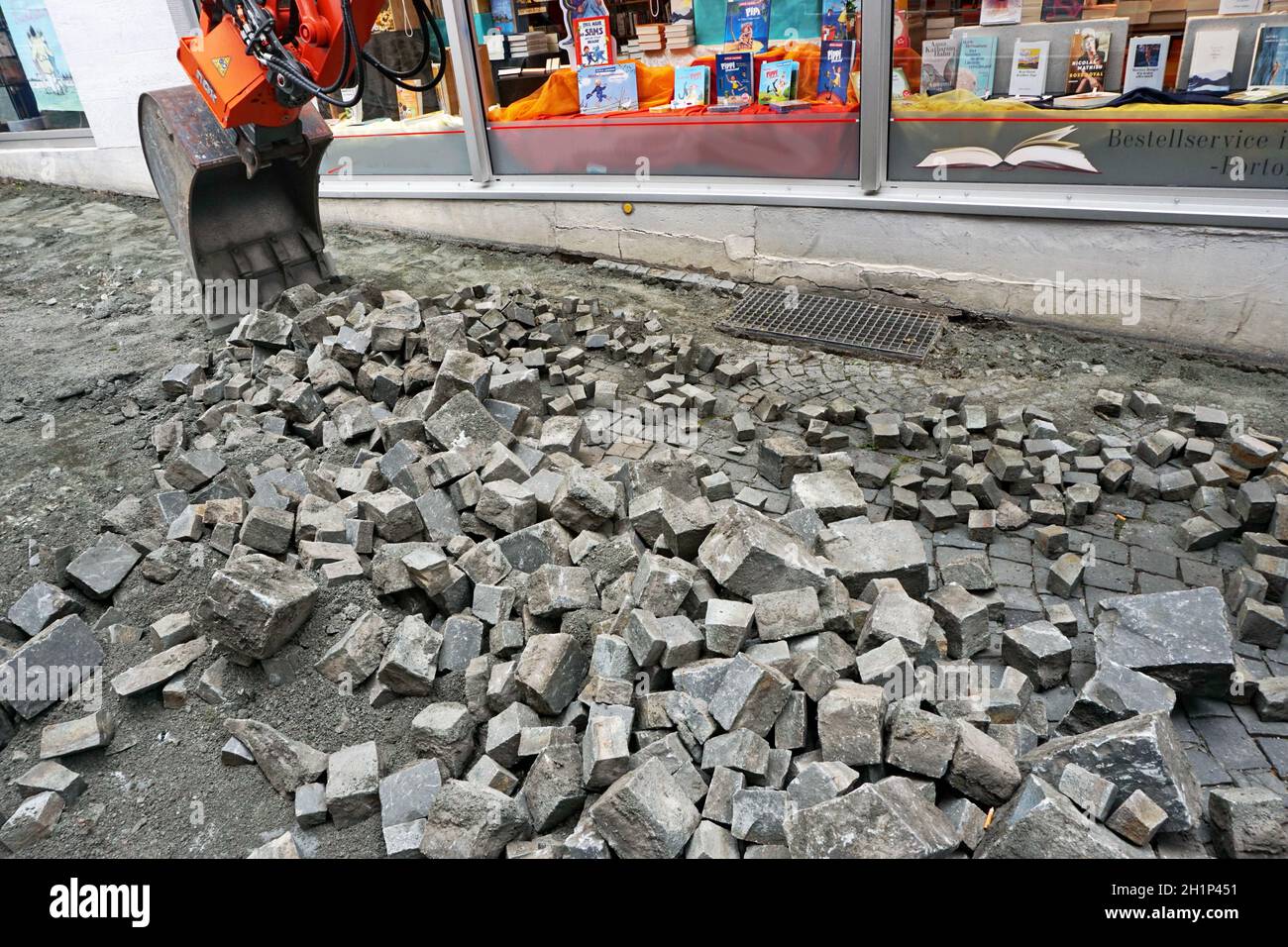 The old cobblestone pavement is being dismantled in the old town. The ...