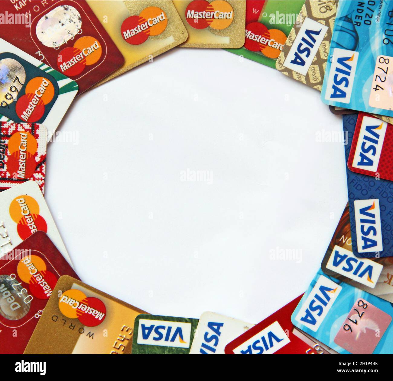 VISA and Mastercard credit cards situated on the edge of picture with ...