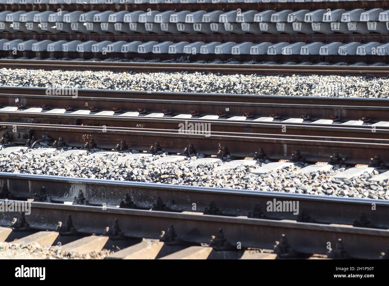 Railroad tracks at the train station. The new railway Stock Photo - Alamy