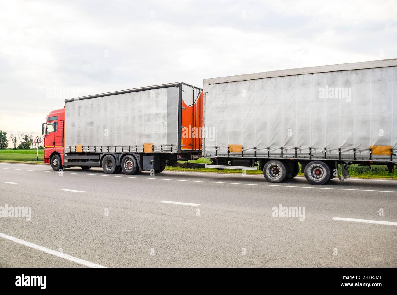 Freight vehicles on the track. Freight car. Truck Stock Photo - Alamy