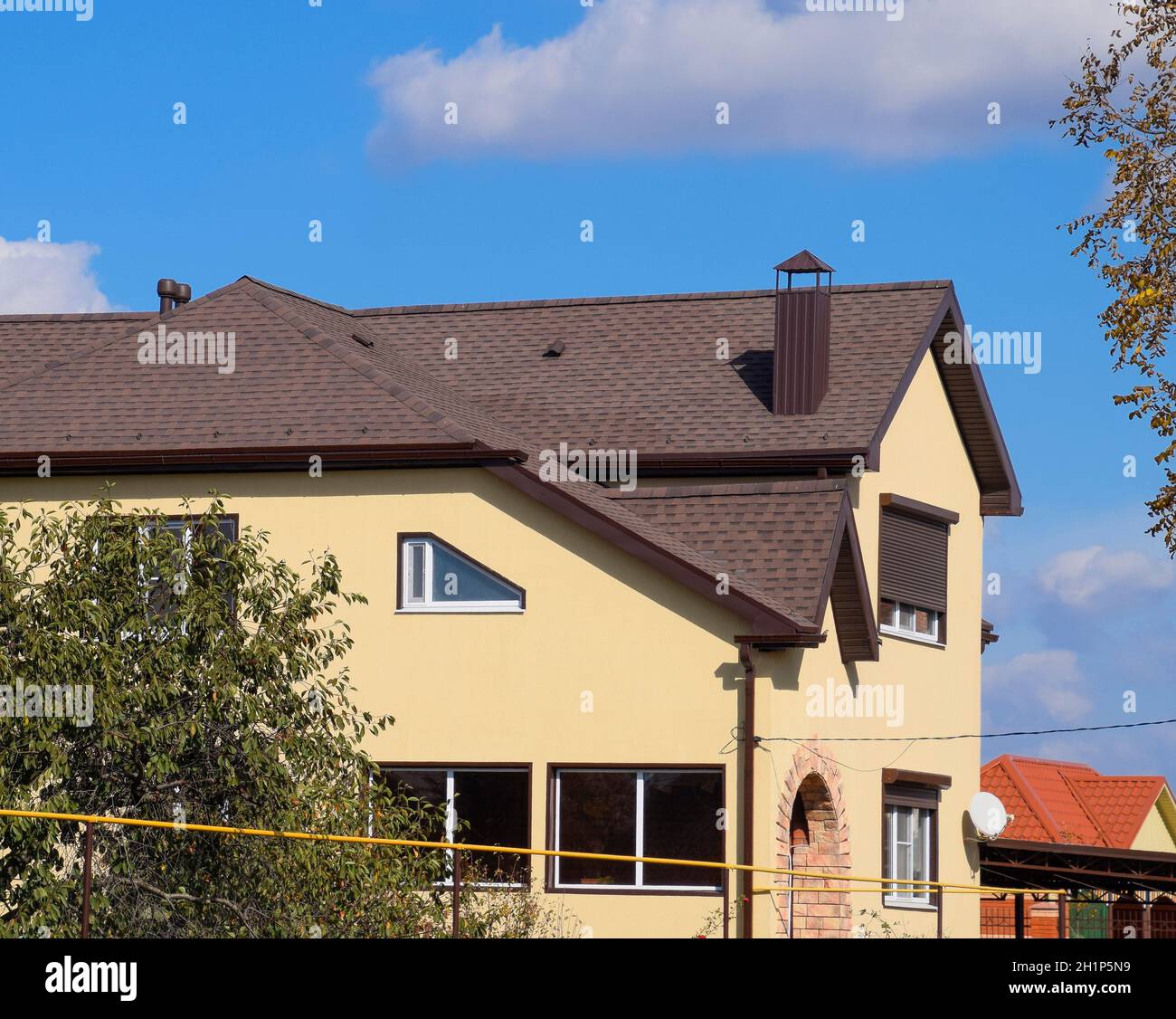 Decorative metal tile on a roof. Types of a roof of roofs. Decorative ...