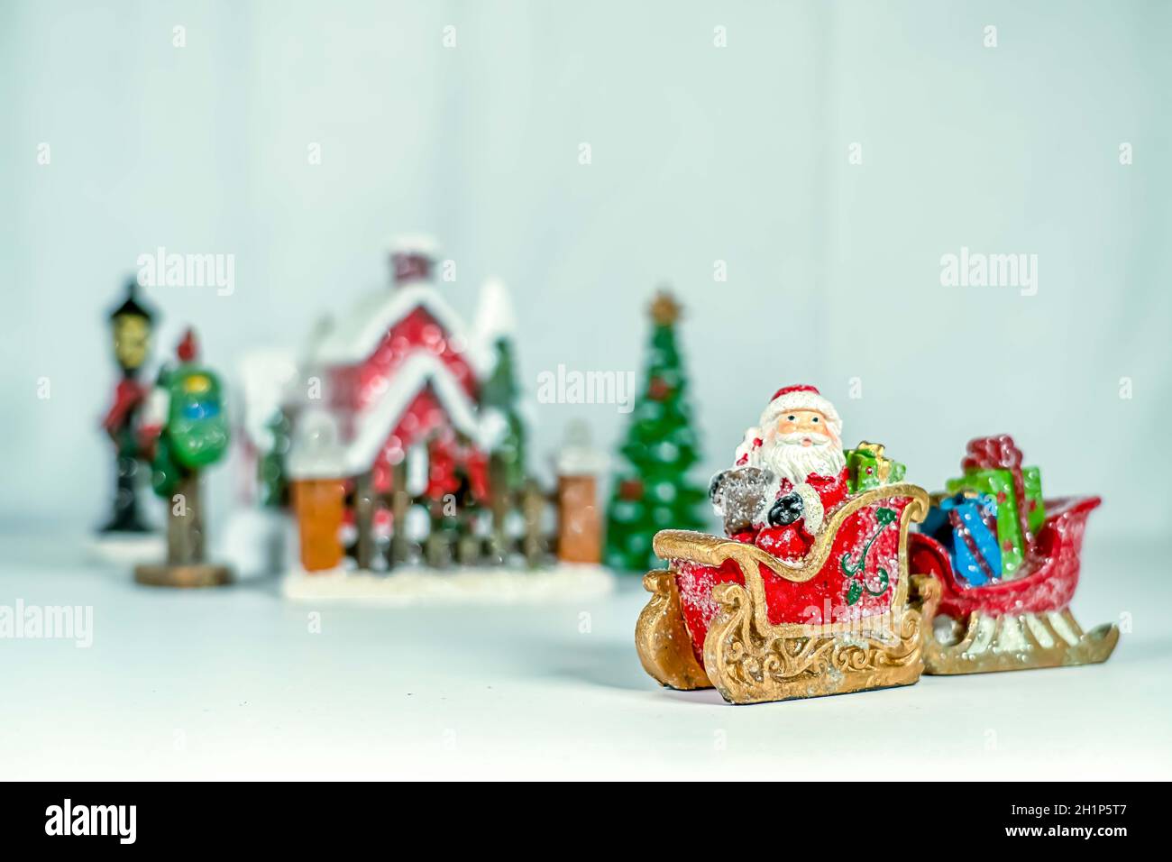 Santa in a sleigh with Christmas gift for the holiday season Stock ...