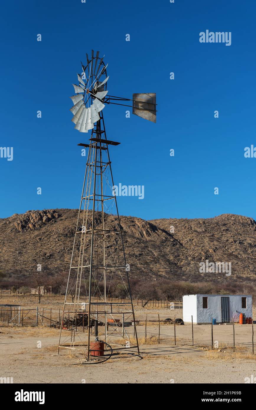 Windmill on a farm in the Erongo Mountains, Namibia Stock Photo - Alamy