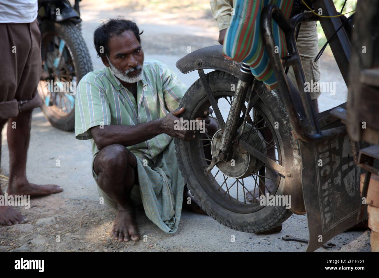 Indian cycle repair hi-res stock photography and images - Alamy