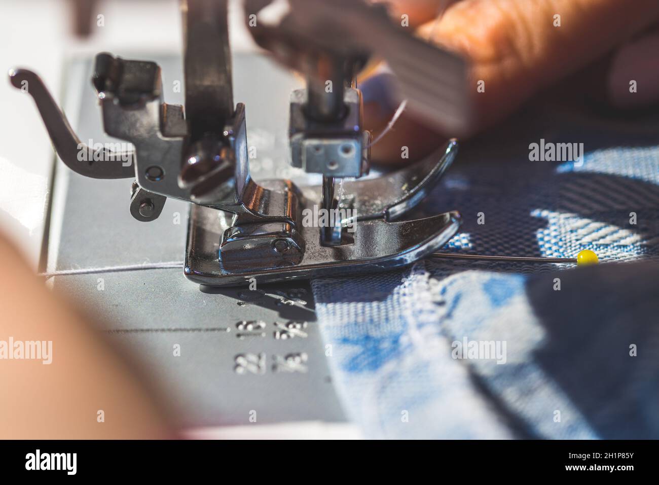 Close up of sewer working with textile and sewing needle Stock Photo ...
