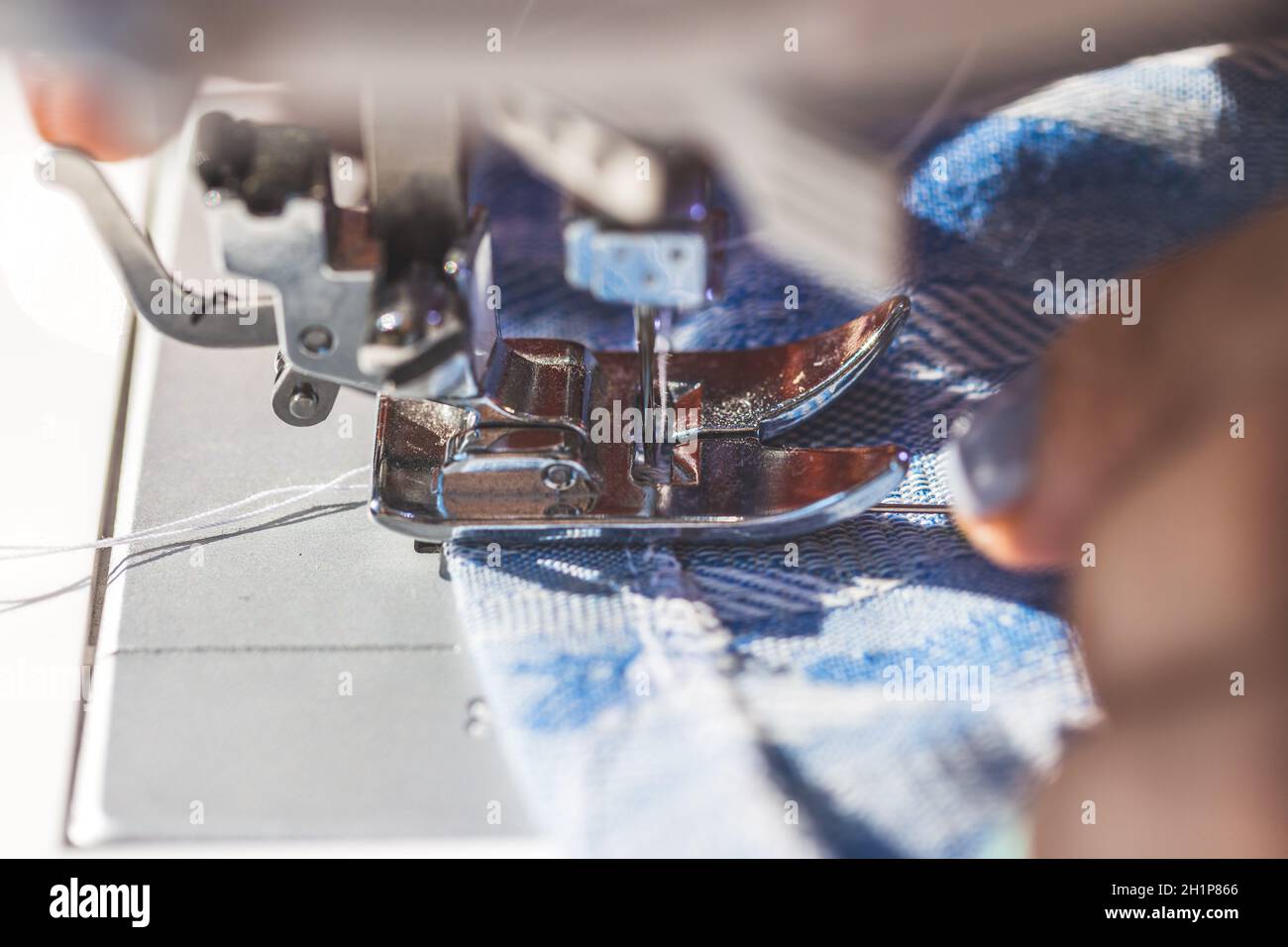 Close up of sewer working with textile and sewing needle Stock Photo ...