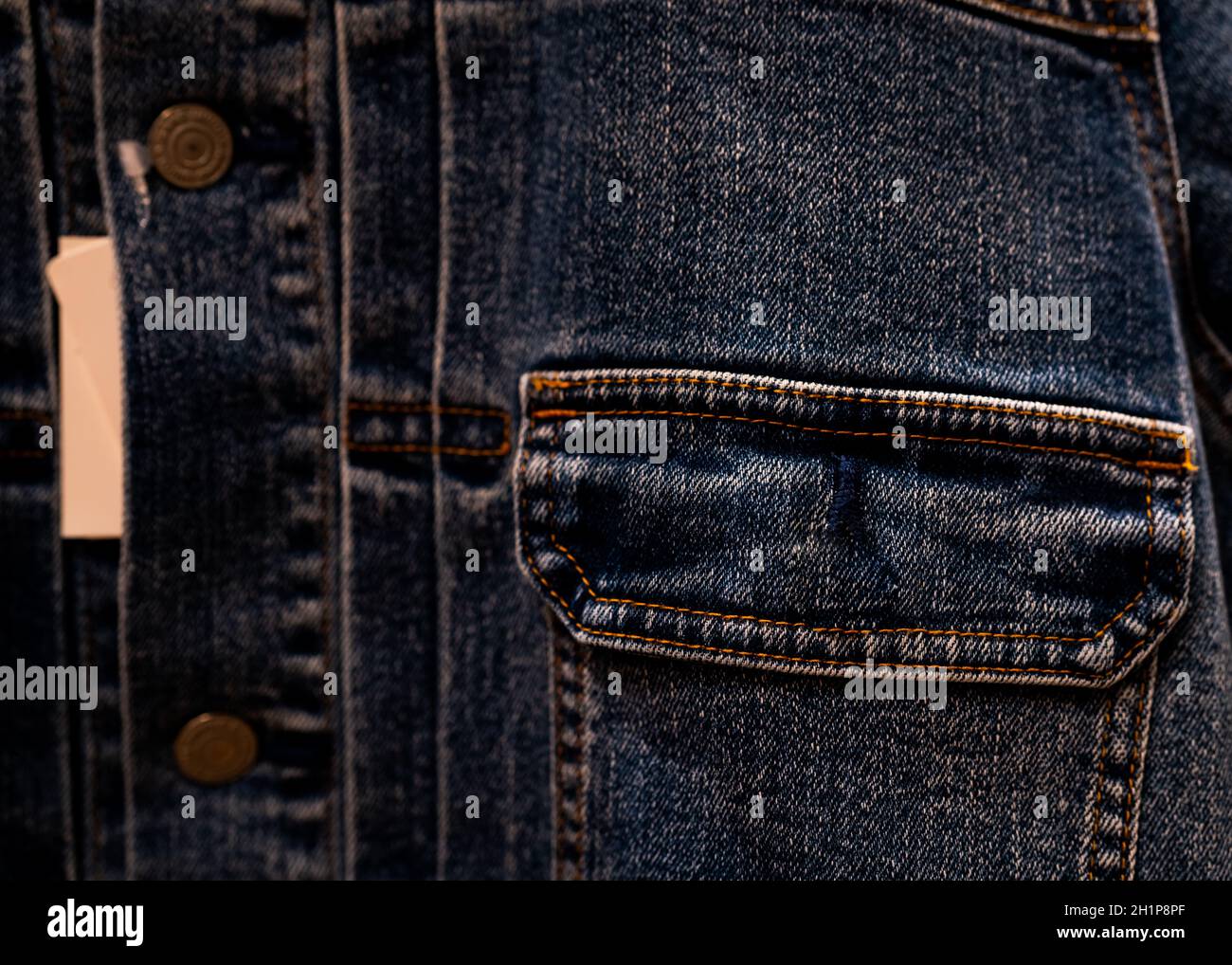 Selective focus on denim jean jacket pocket in clothes shop. Denim ...