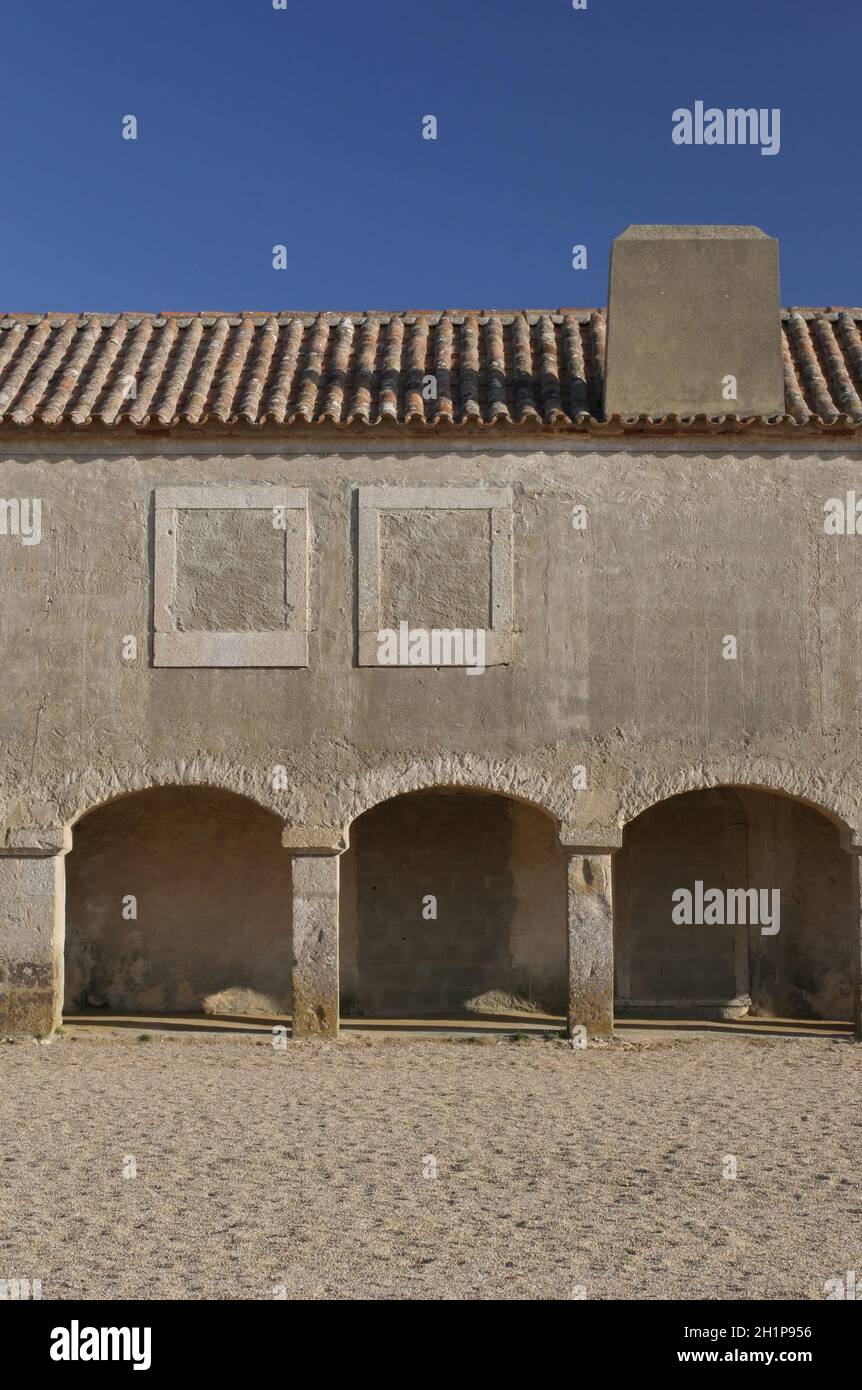 old building with lots of arcs, isolated in blue sky background Stock ...