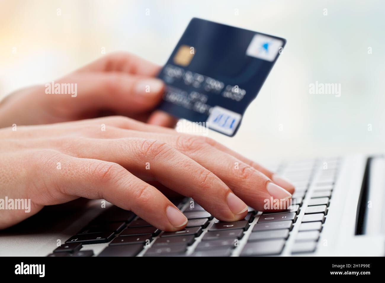 Female hands typing credit card hi-res stock photography and images - Alamy