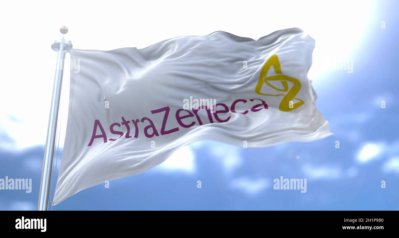 Rome, Italy, January 26, 2021: White flag with the new Astrazeneca logo ...