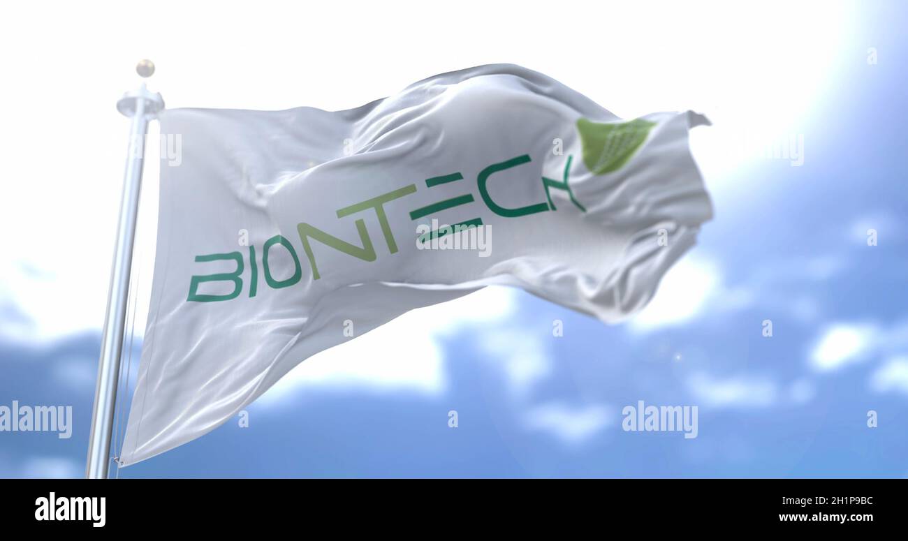 Rome, Italy, January 26, 2021: White flag with the Biontech logo waving ...
