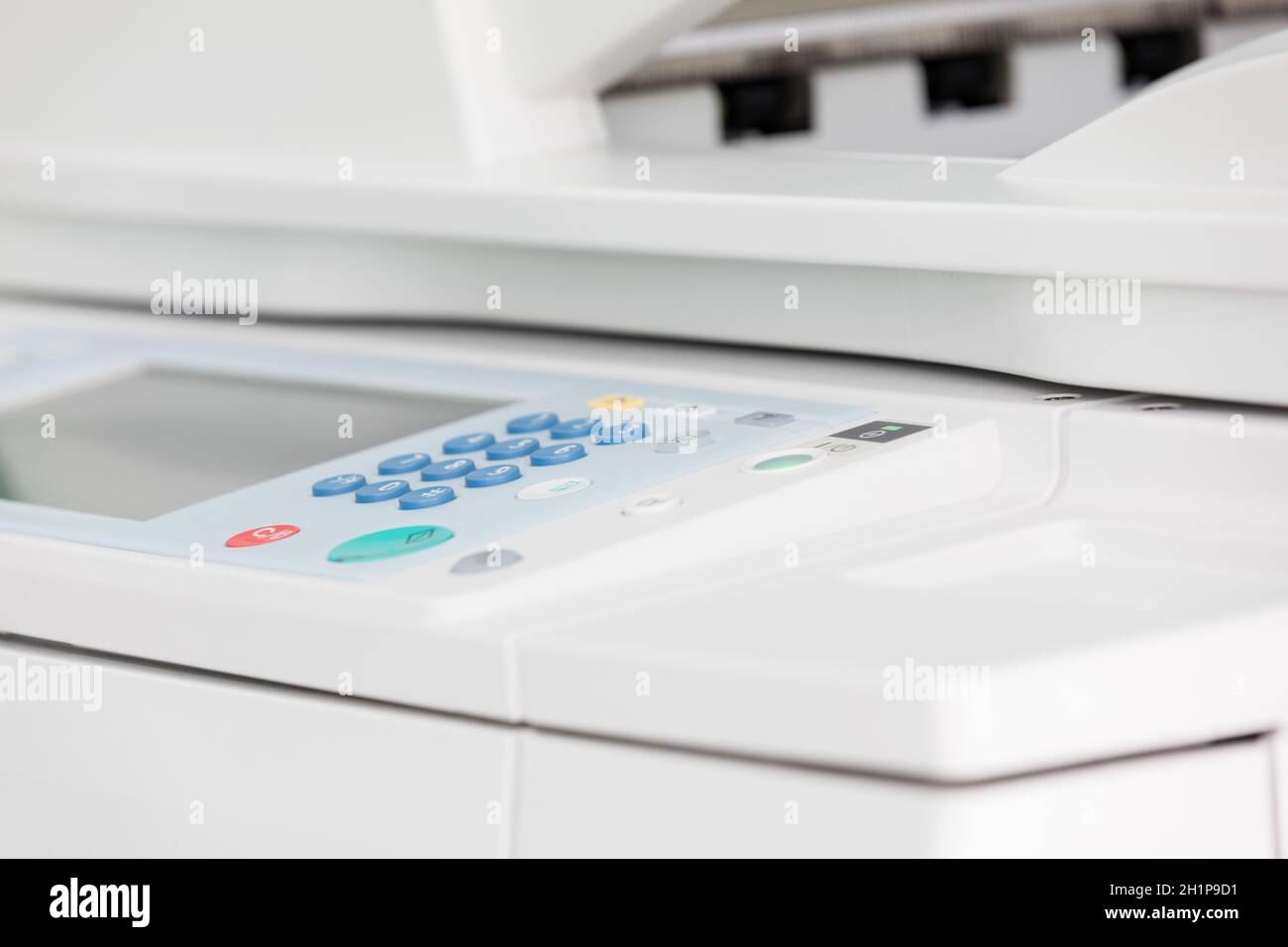 Detail of a modern digital printer of a copy center Stock Photo - Alamy