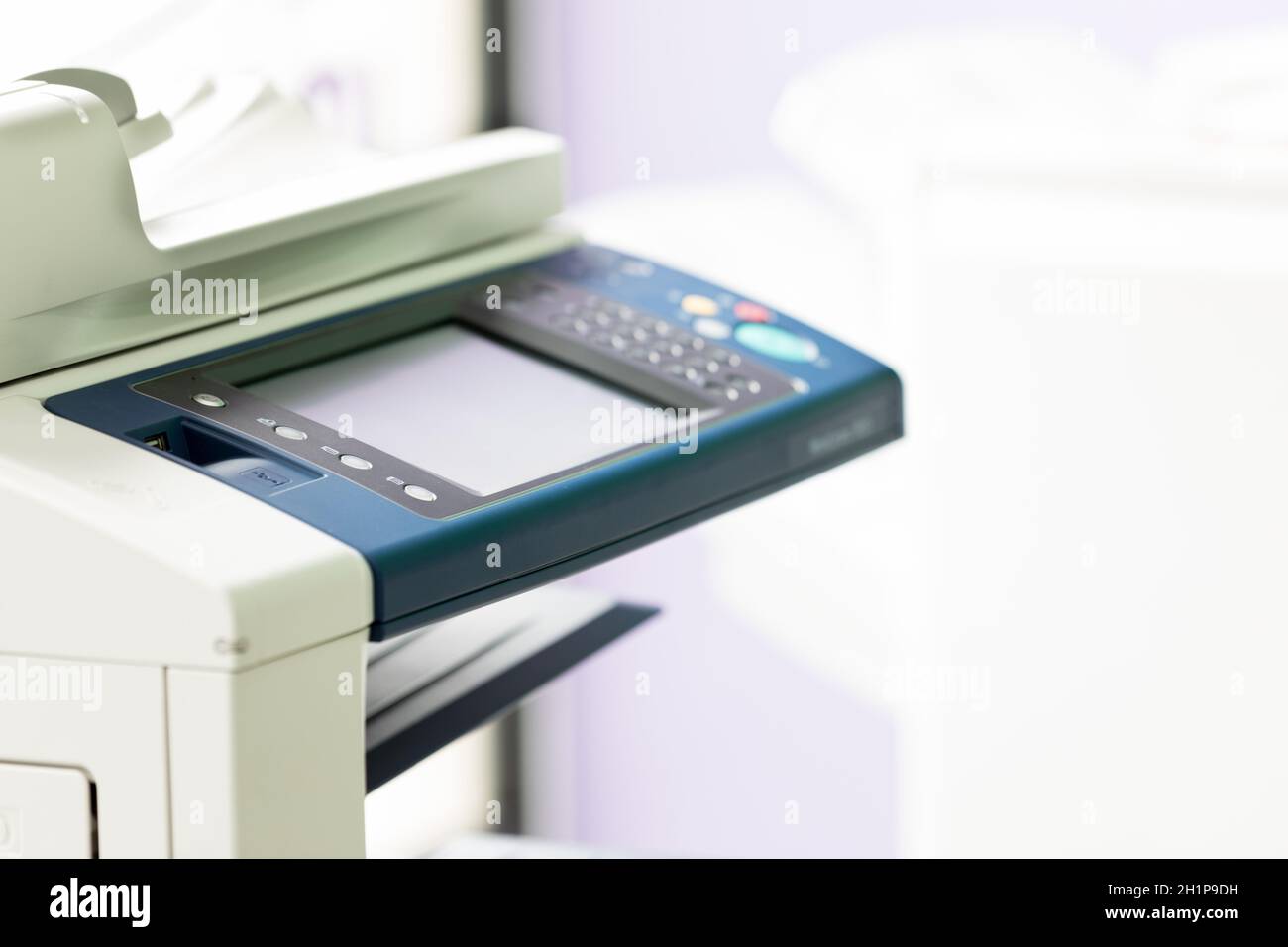 Detail of a modern digital printer of a copy center Stock Photo - Alamy