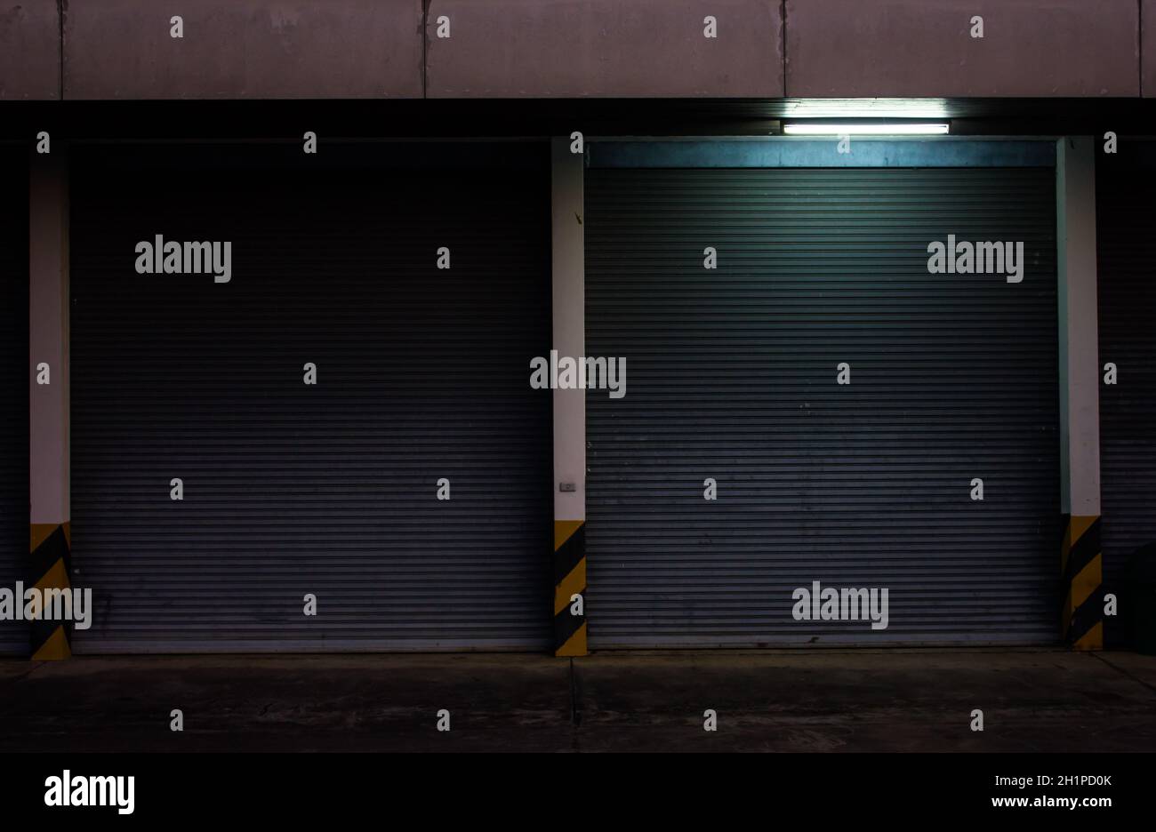 Warehouse Gate at night Stock Photo - Alamy