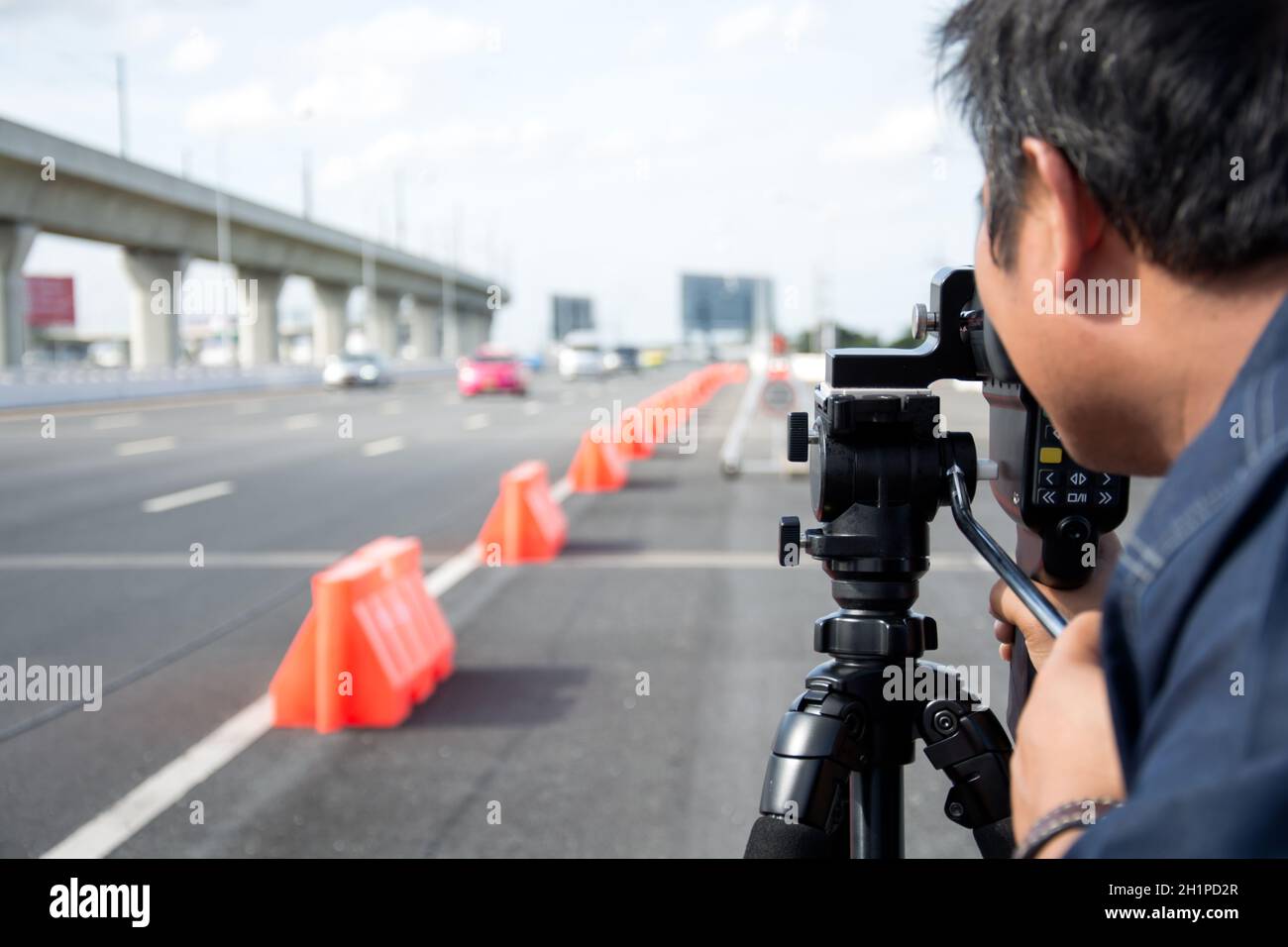 catch speeding drivers with a radar gun Stock Photo - Alamy