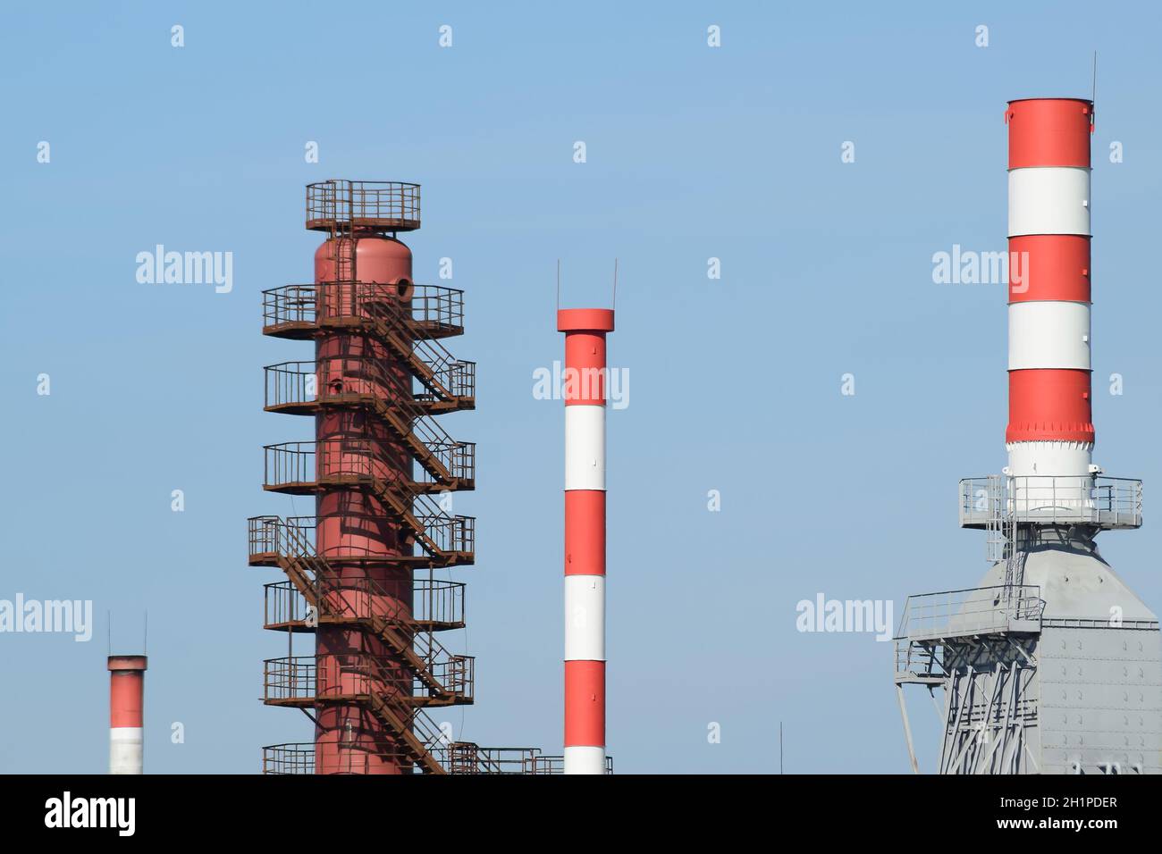 Pipes refinery furnaces and distillation column. The equipment at the ...