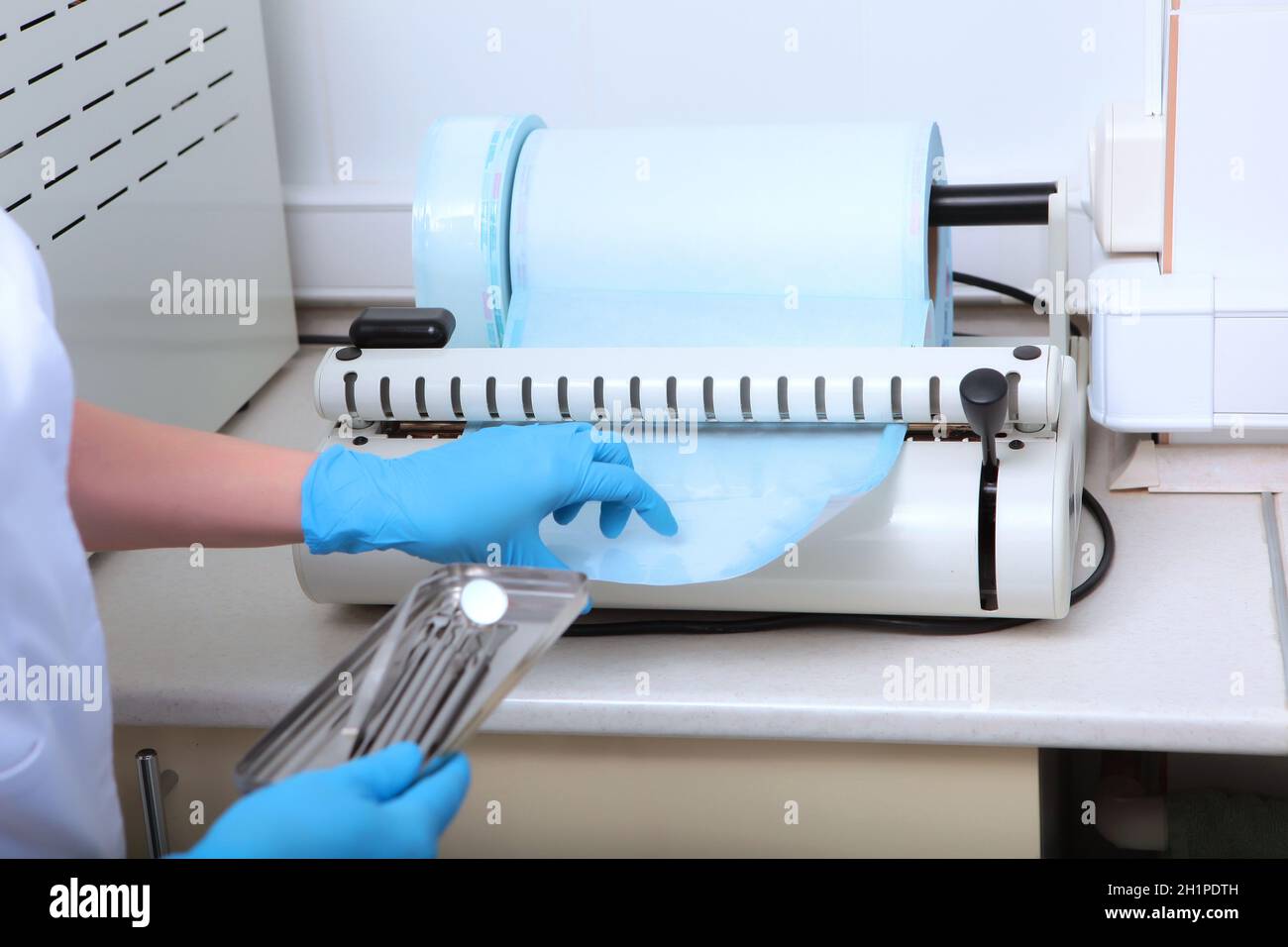 Special packaging equipment for dental devices. Concept of disinfection ...