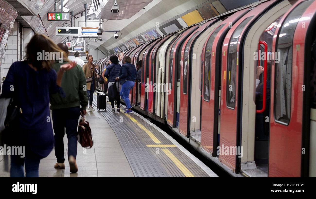 LONDON, UK - CIRCA SEPTEMBER 2019: passengers boarding and alighting ...