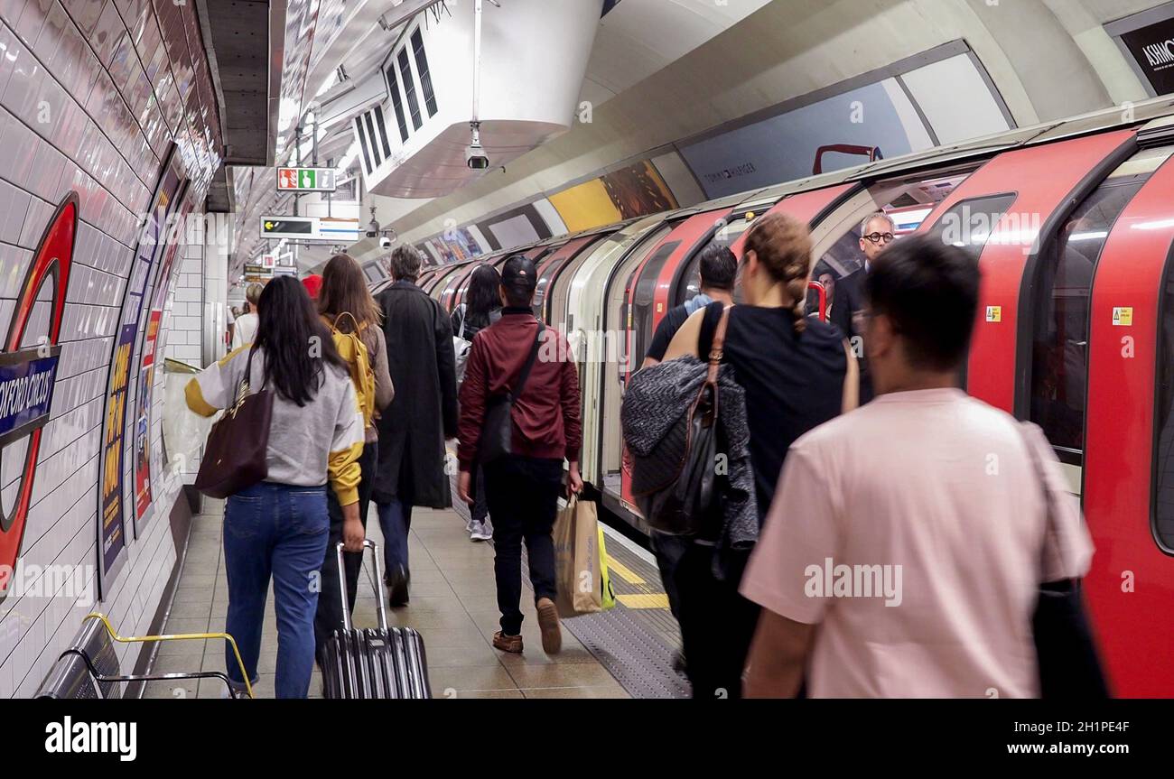LONDON, UK - CIRCA SEPTEMBER 2019: passengers boarding and alighting ...