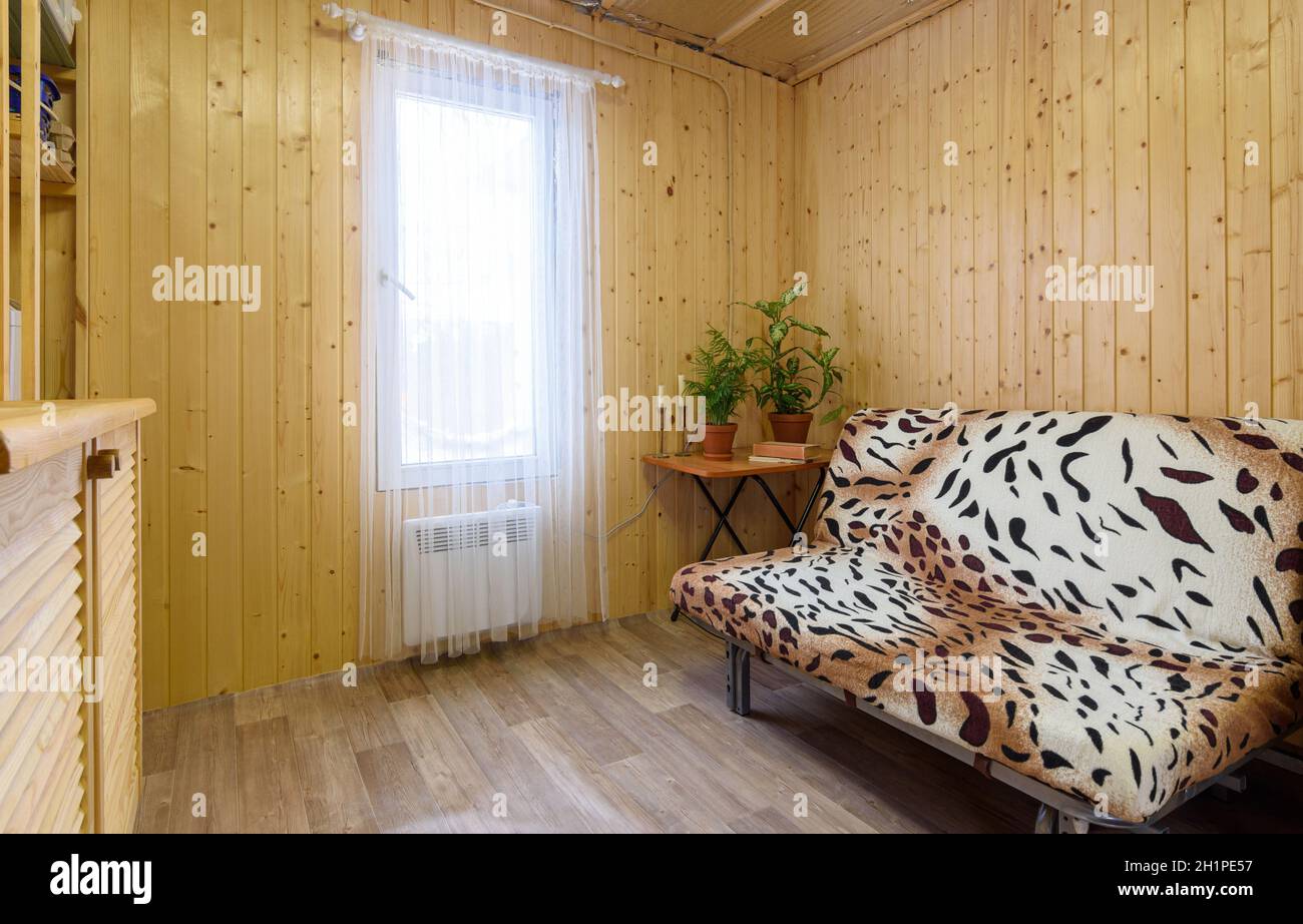 Interior of a small modest living room of a country house Stock Photo ...
