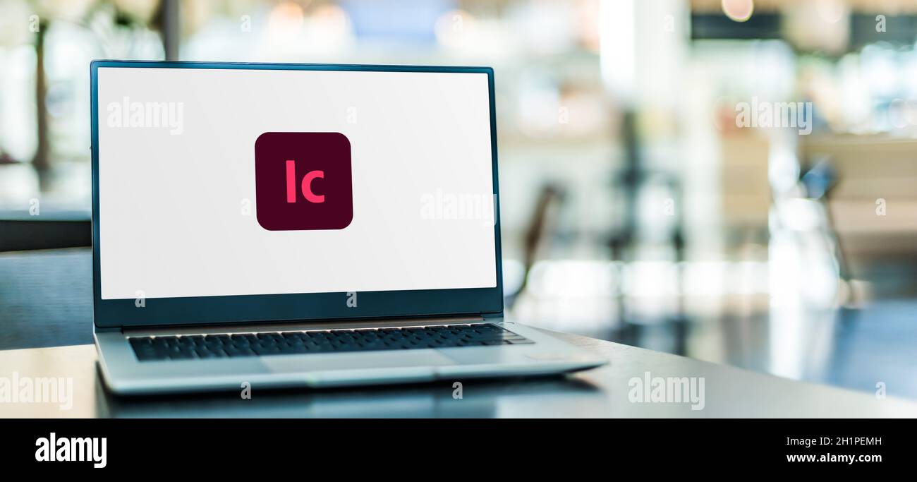 POZNAN, POL - NOV 12, 2020: Laptop computer displaying logo of Adobe ...