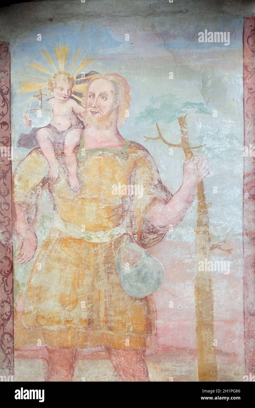 Saint Christopher, fresco on the facade of Saint George church in Luson ...
