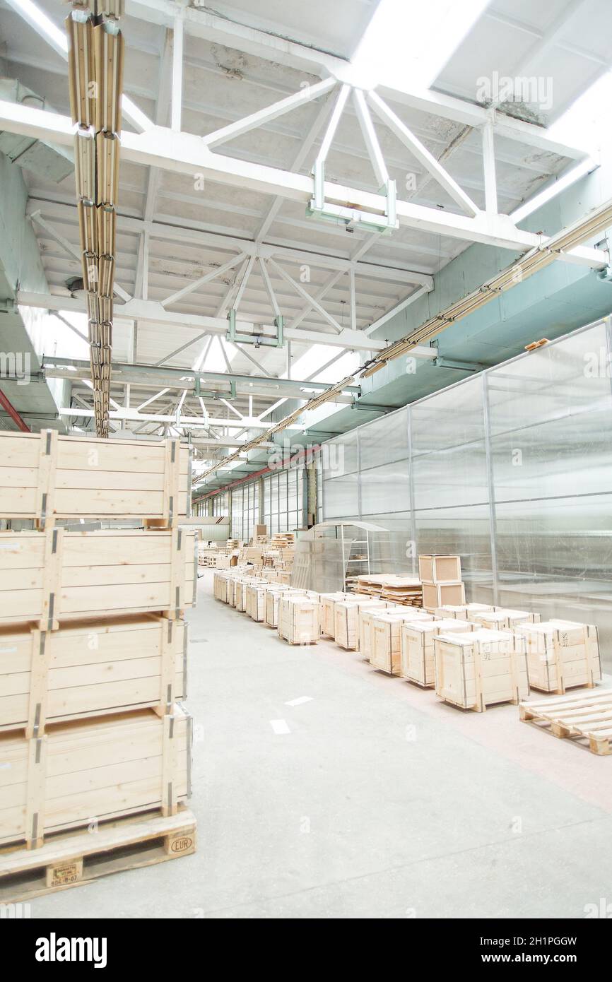 Factory premises for storing products. Large, tall hangar in a factory ...