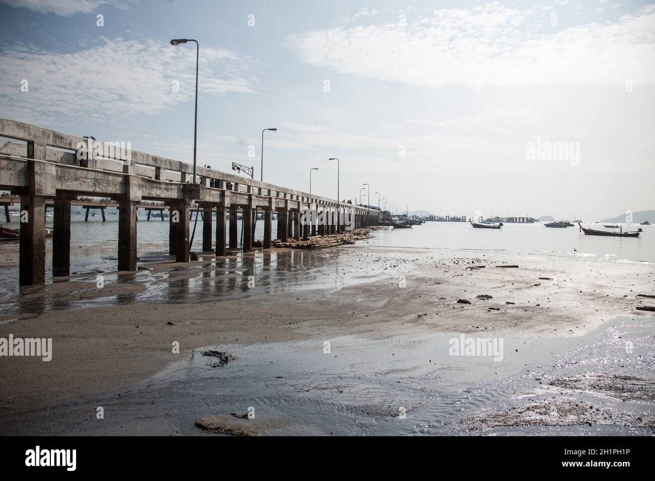 Large pier, dock for boats and boats for walking on water. Resort in ...
