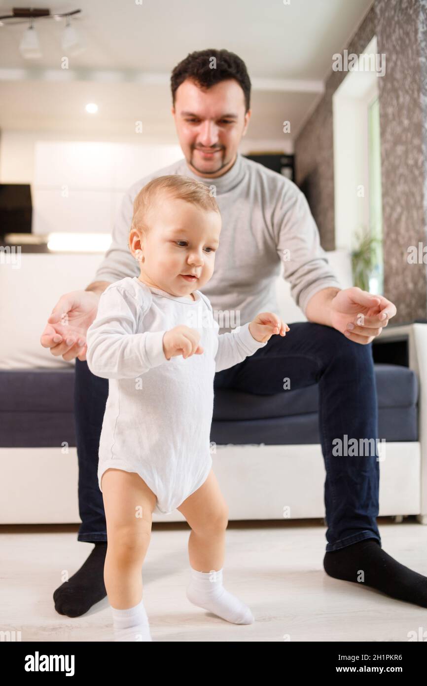 Baby on steps of house hi-res stock photography and images - Alamy