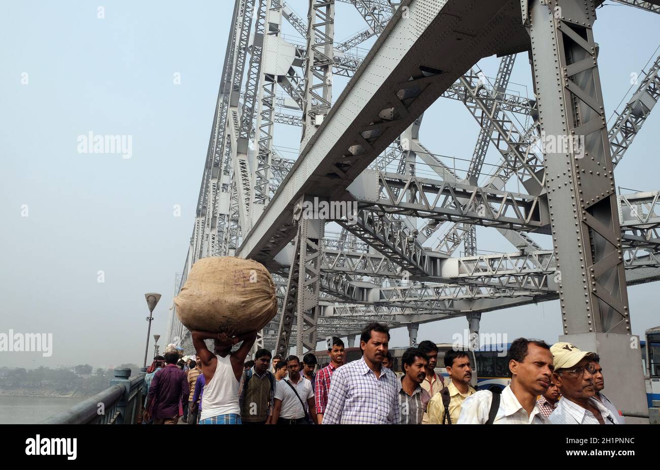 Morning rush hour, people crossing the Howrah bridge, Kolkata, India ...